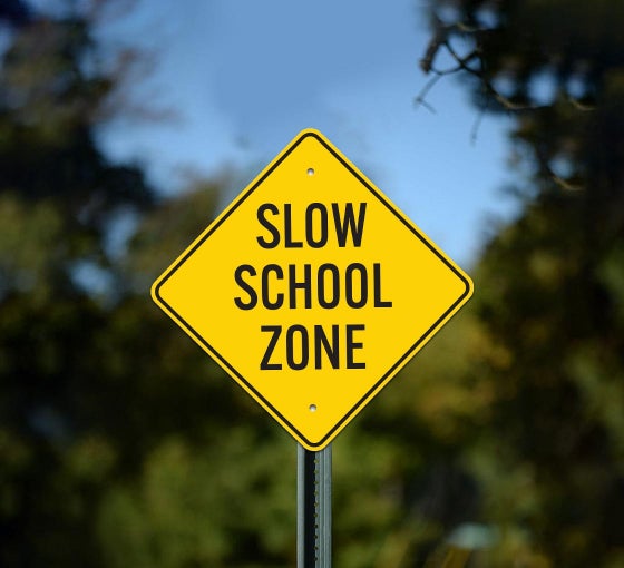 Slow School Zone Sign