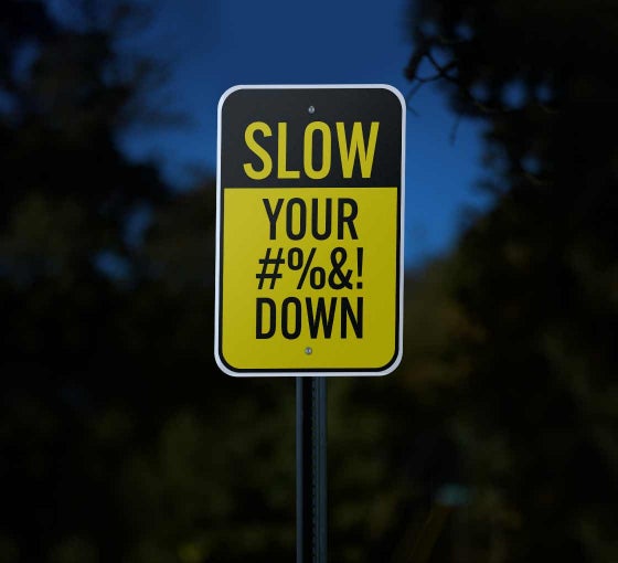 Slow Down Sign